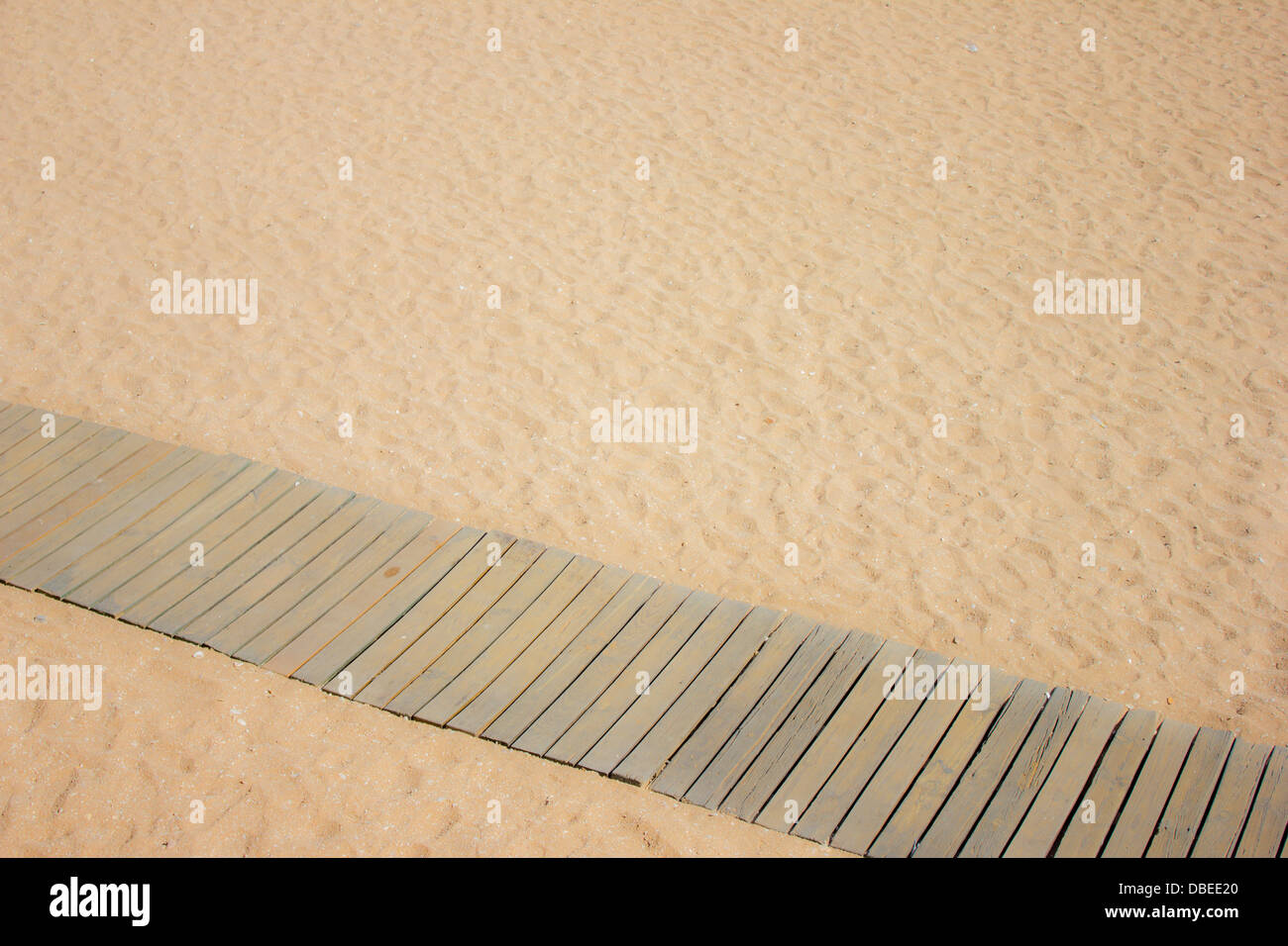 wood gangway in yellow sand Stock Photo - Alamy