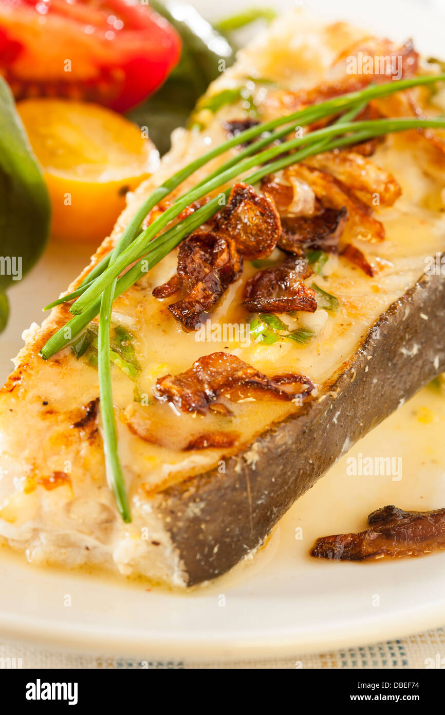 Organic Homemade Grilled Halibut Fish with a Salad Stock Photo - Alamy
