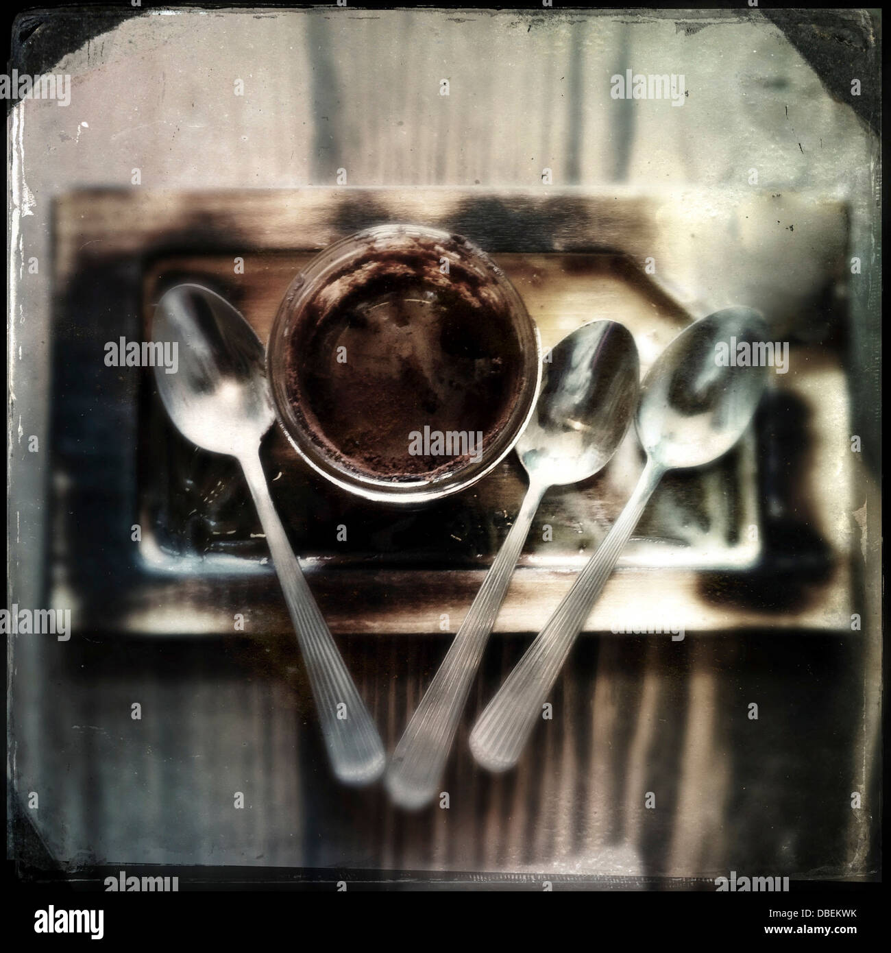 Jar and spoons on tray Stock Photo - Alamy
