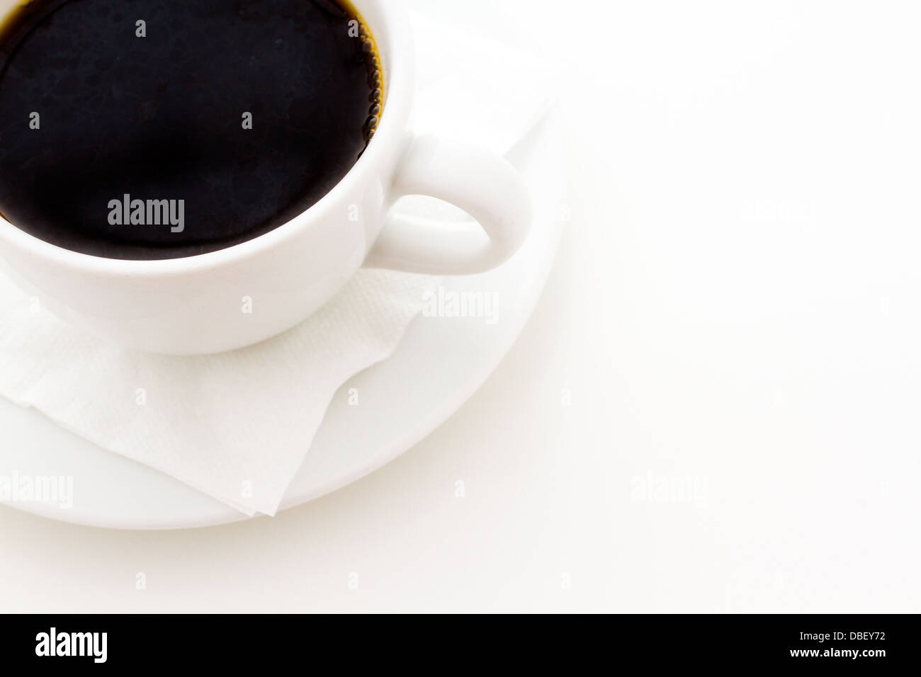 Black coffee in white on a white background Stock Photo - Alamy