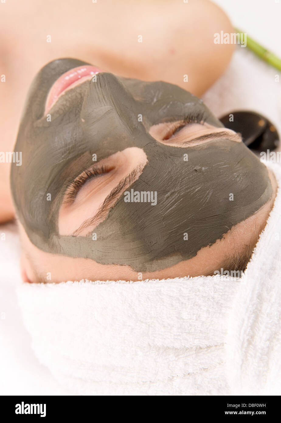 Sea Mud Mask On The Woman's Face. Spa Stock Photo - Alamy