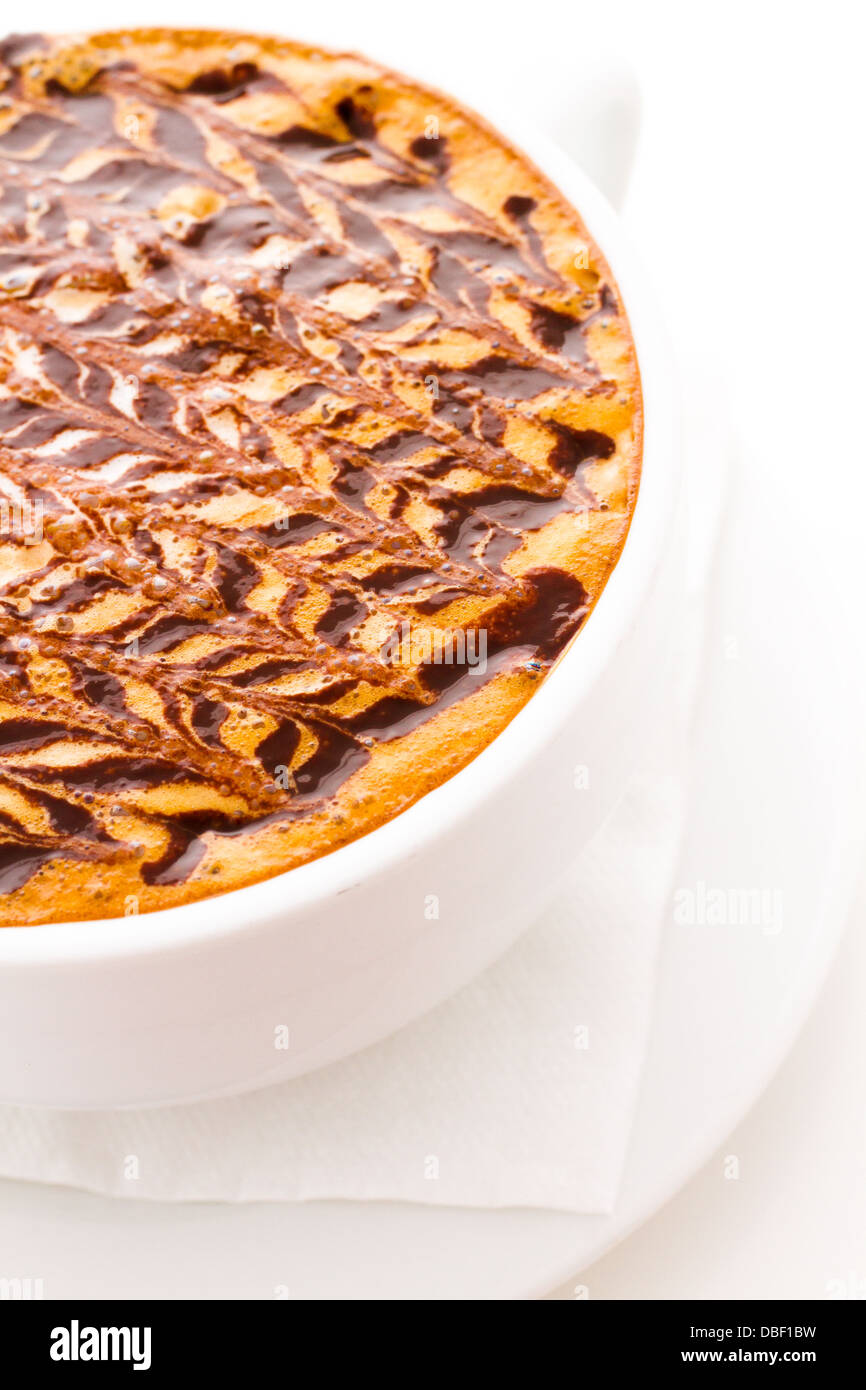 Coffee Napoleon in white cup on a white background Stock Photo - Alamy