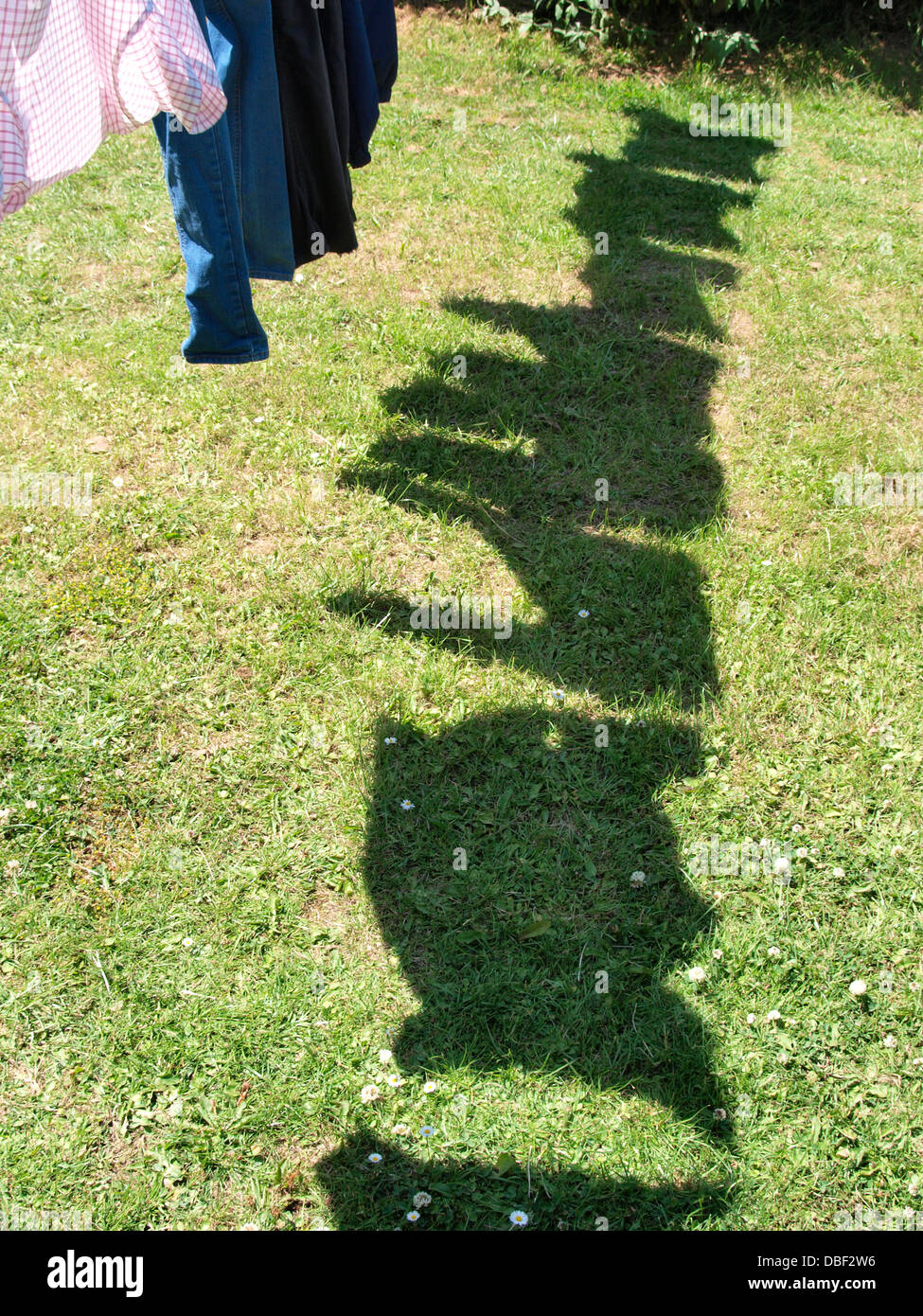 Shadow of a washing line on the grass, UK 2013 Stock Photo - Alamy