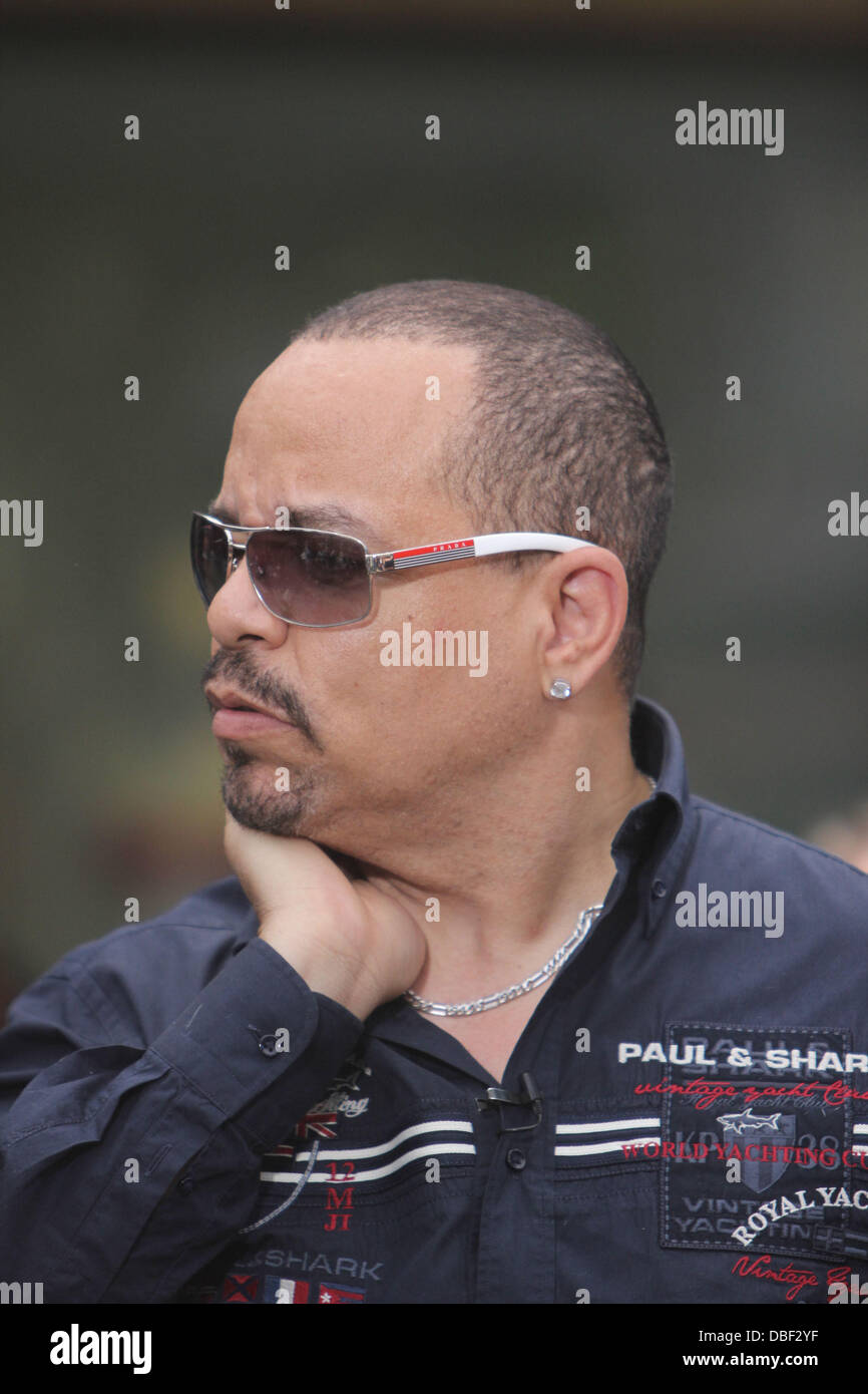 Rapper Ice-T filming for the entertainment television news programme ...