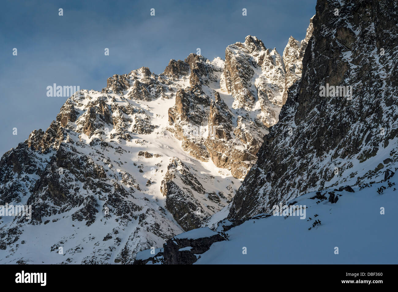 sharp mountain edge in evening light Stock Photo - Alamy
