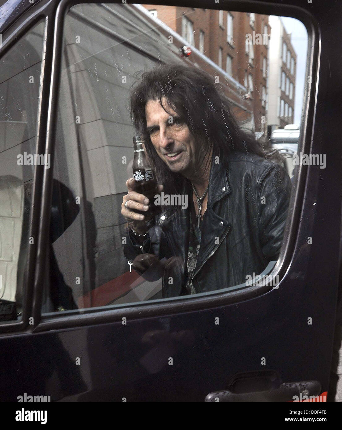 Legend Alice Cooper blew his cover as a wild shock rocker by carrying ...