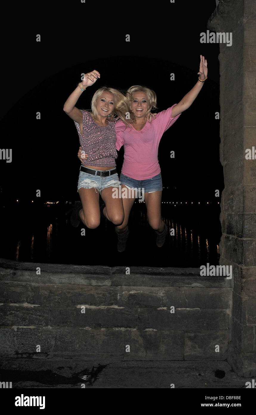 Twins Brittany Taltos (in pink) and her sister Erica Taltos enjoy a ...