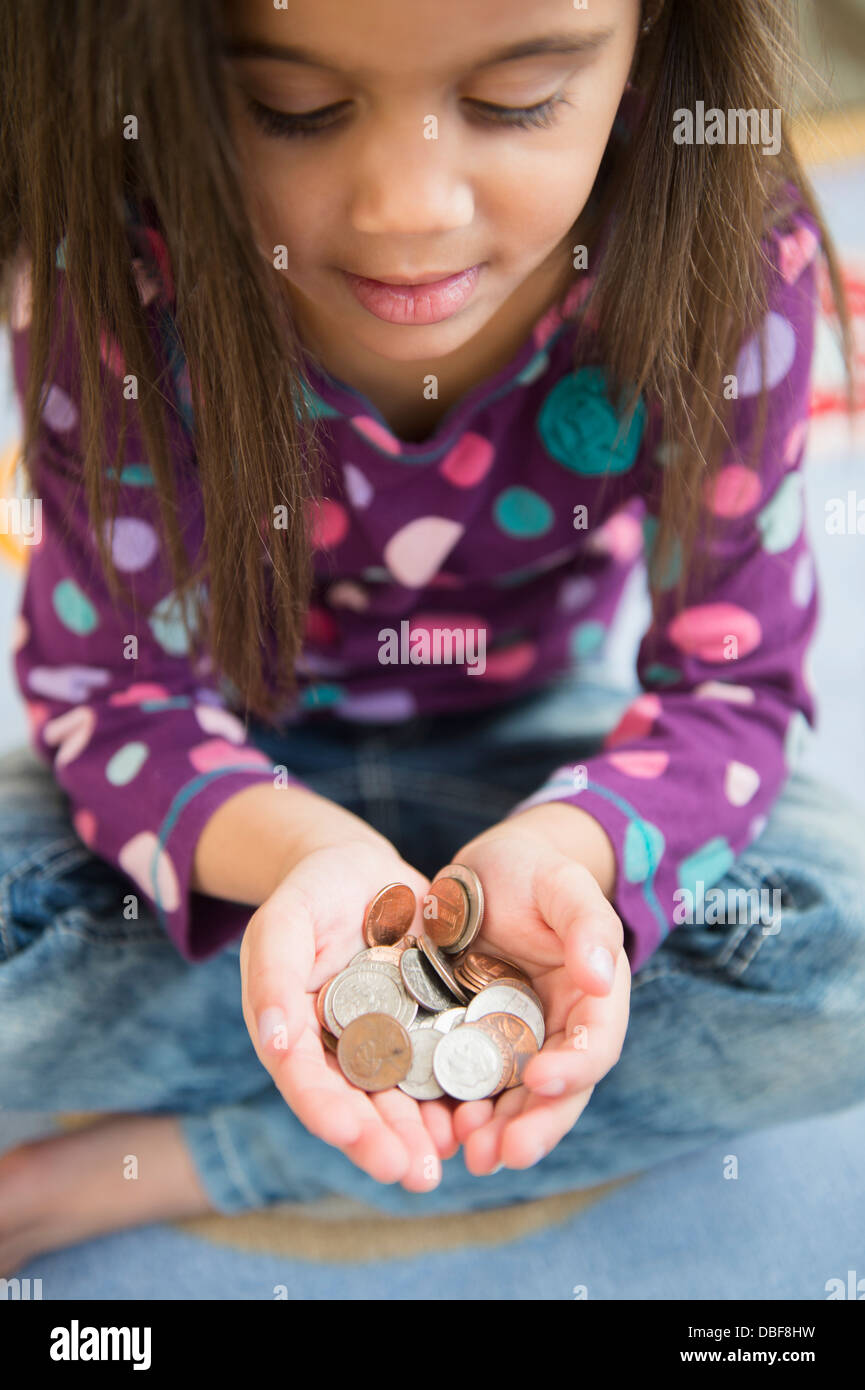Holding three coins hi-res stock photography and images - Alamy