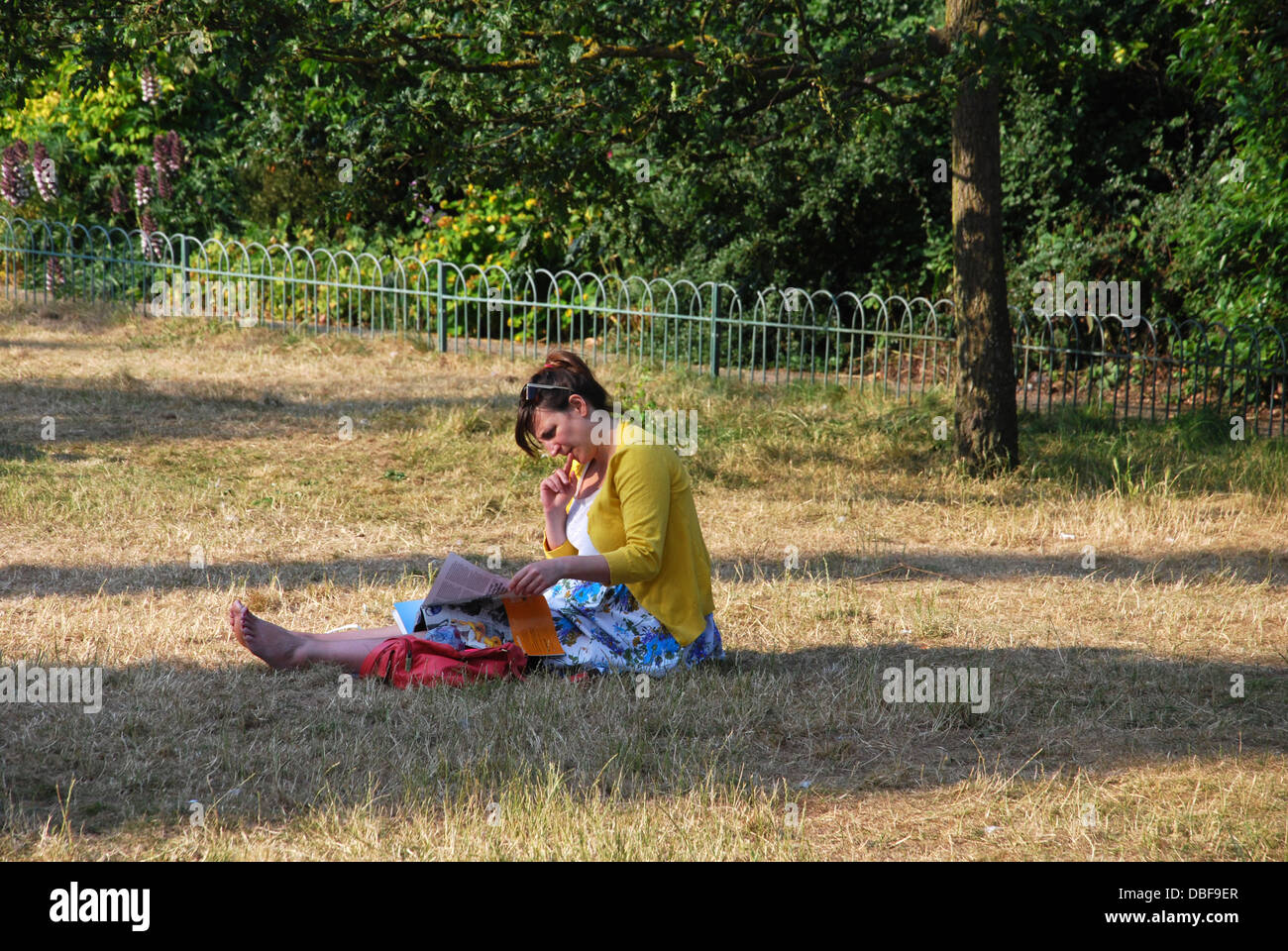 student reading in the grounds of The Royal Pavillion Brighton United ...
