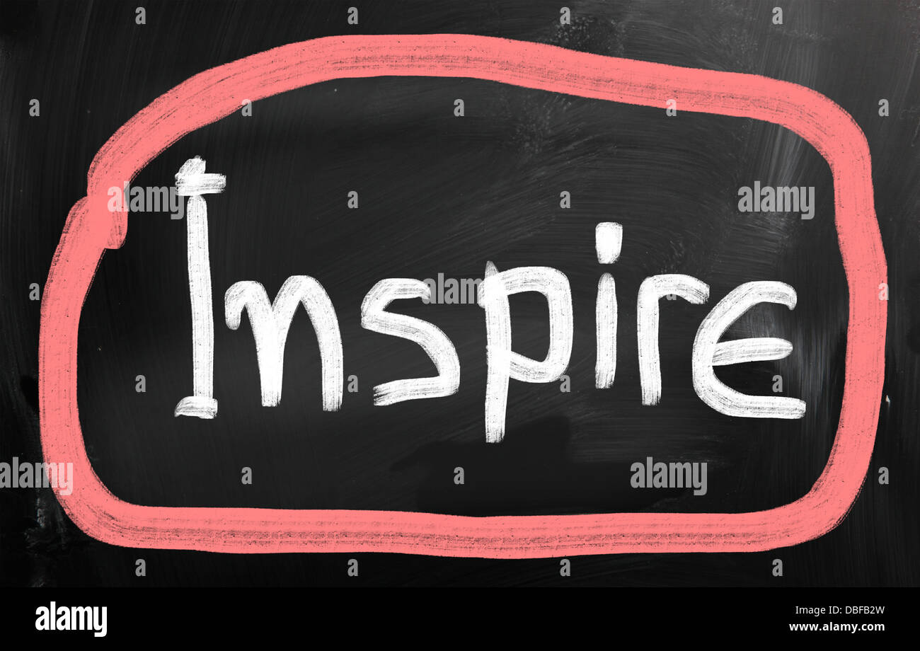 Inspire handwritten with chalk on a blackboard Stock Photo - Alamy
