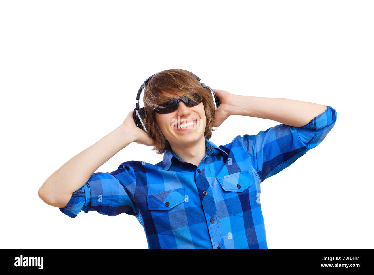 Happy smiling young man dancing Stock Photo - Alamy
