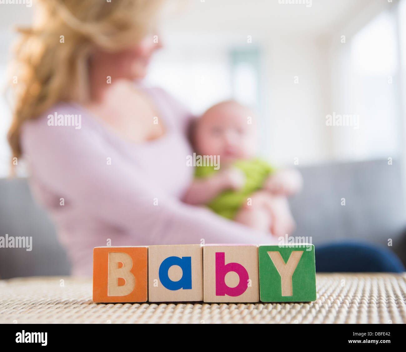 Close up of wooden blocks spelling 'baby' Stock Photo - Alamy