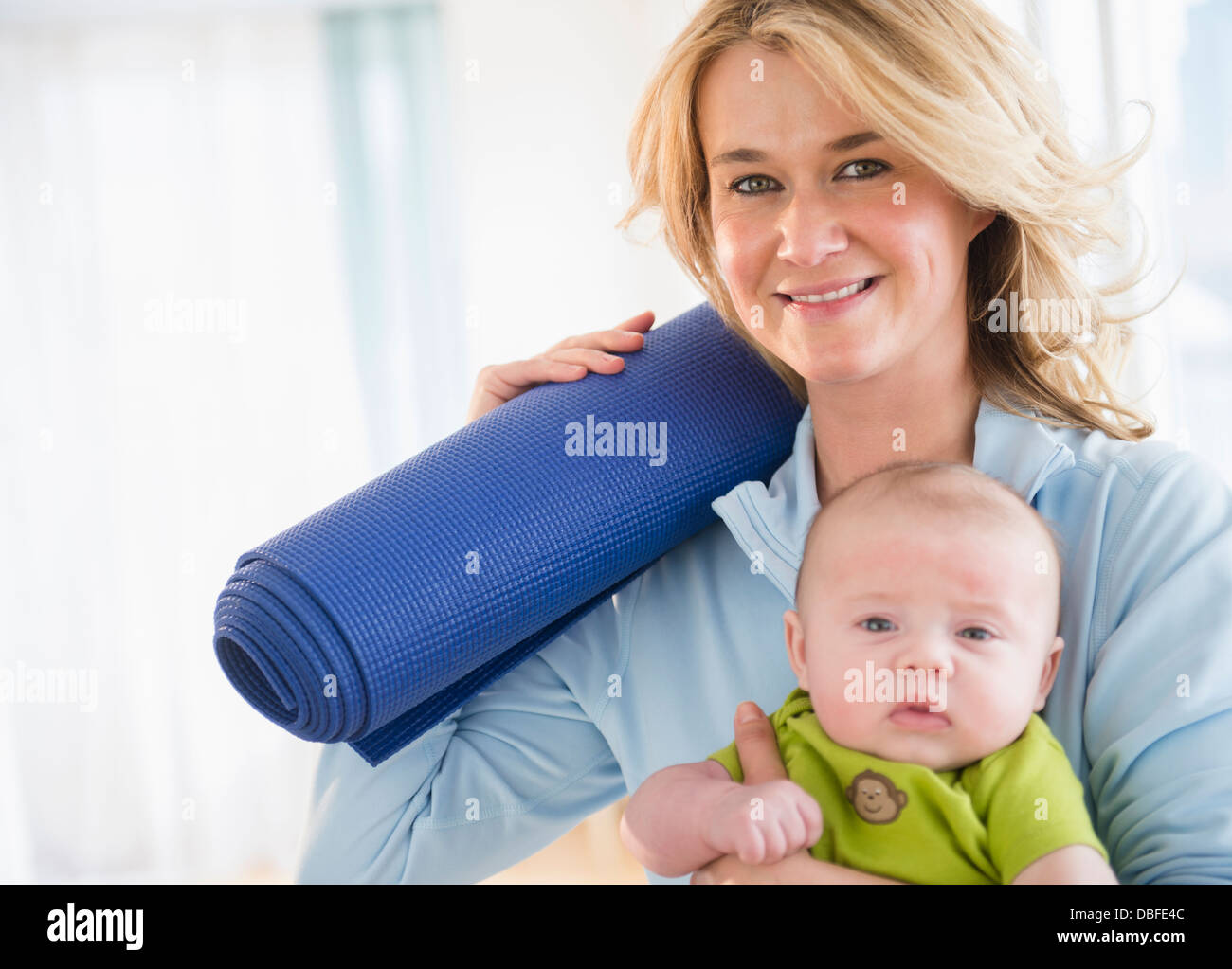 Baby holding front hi-res stock photography and images - Alamy