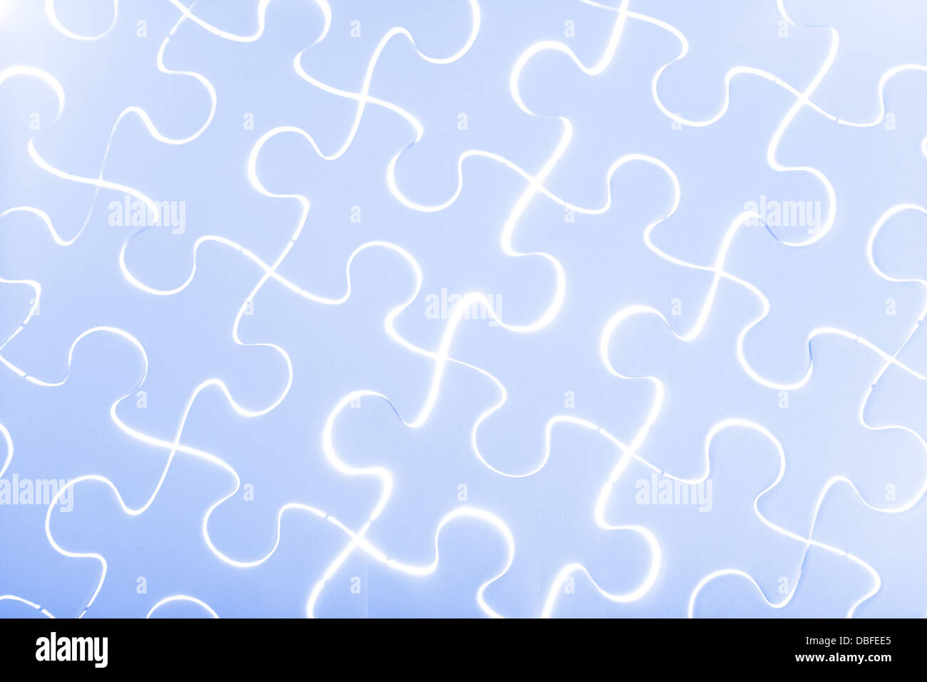 Puzzle in blue Stock Photo - Alamy