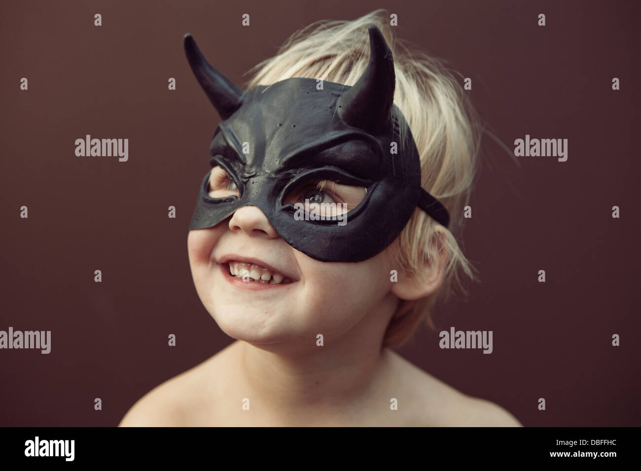 Caucasian boy wearing mask Stock Photo - Alamy