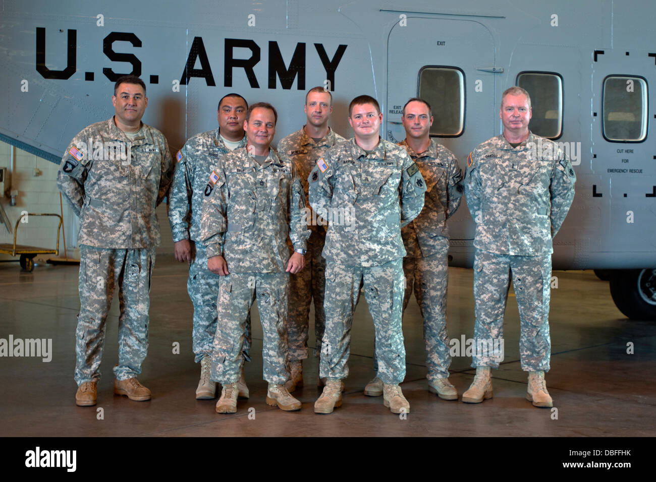 Chief Warrant Officer Kelly Cawood (far right), commander of Detachment ...
