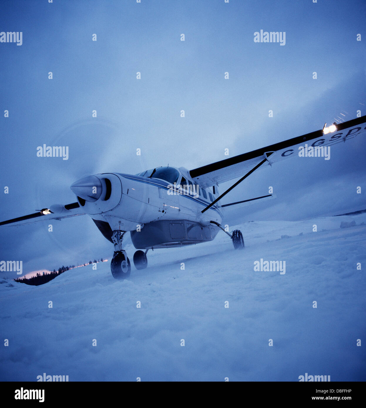 Caravan turboprop single engine high wing aircraft ramp snow cold hi ...