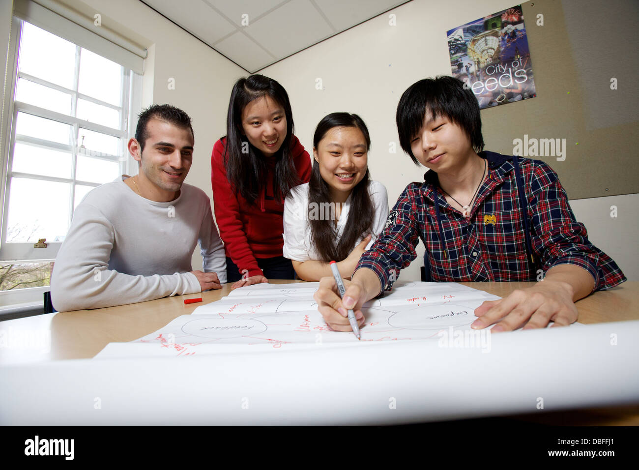 international students working together in classroom Stock Photo - Alamy