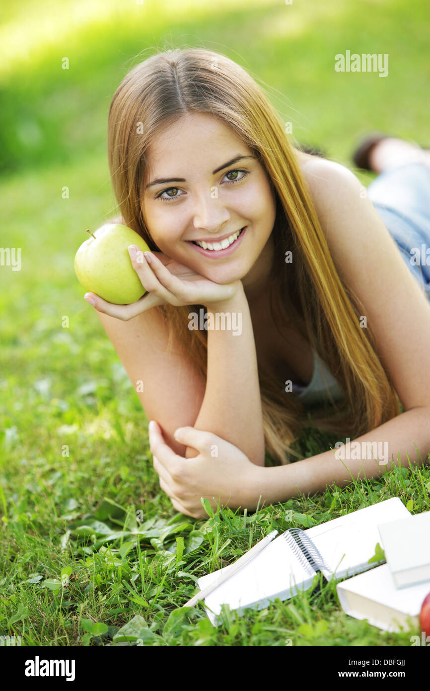 Student with apple Stock Photo - Alamy