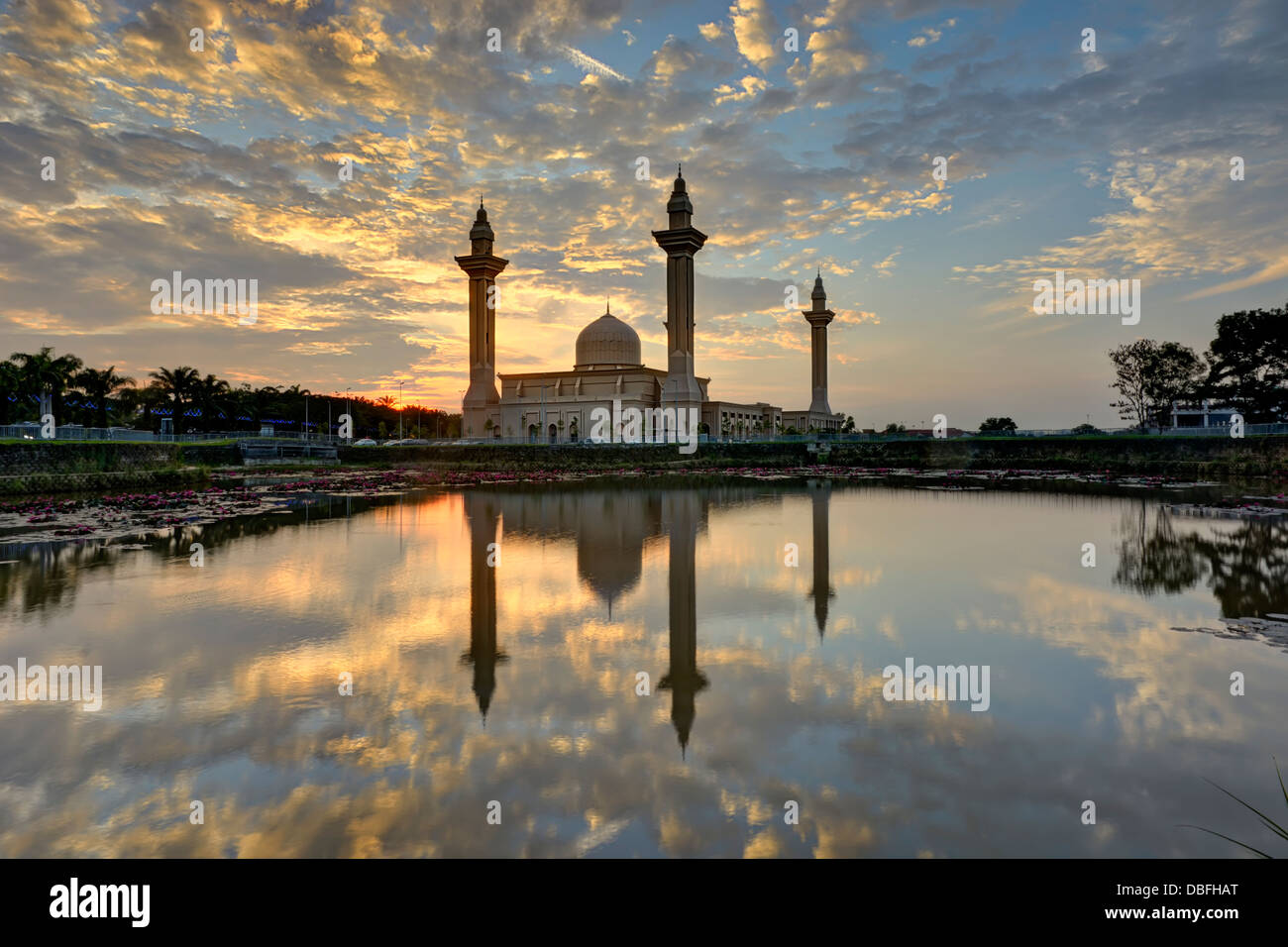 Mosque with reflection during golden hours sunrise Stock Photo - Alamy