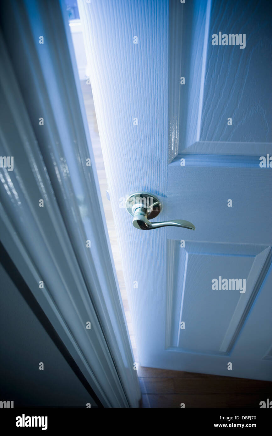 Close up of handle on open door Stock Photo - Alamy