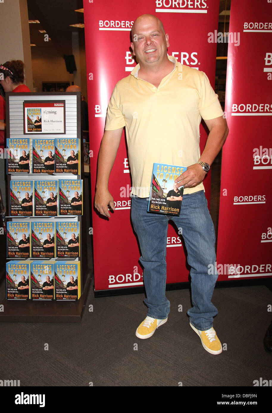 Rick Harrison of 'Pawn Stars' signs his book "License To Pawn"at ...