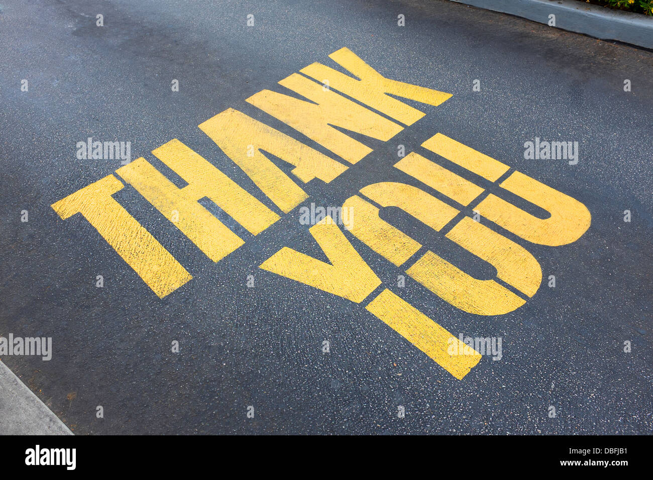 'Thank you' painted on concrete Stock Photo - Alamy