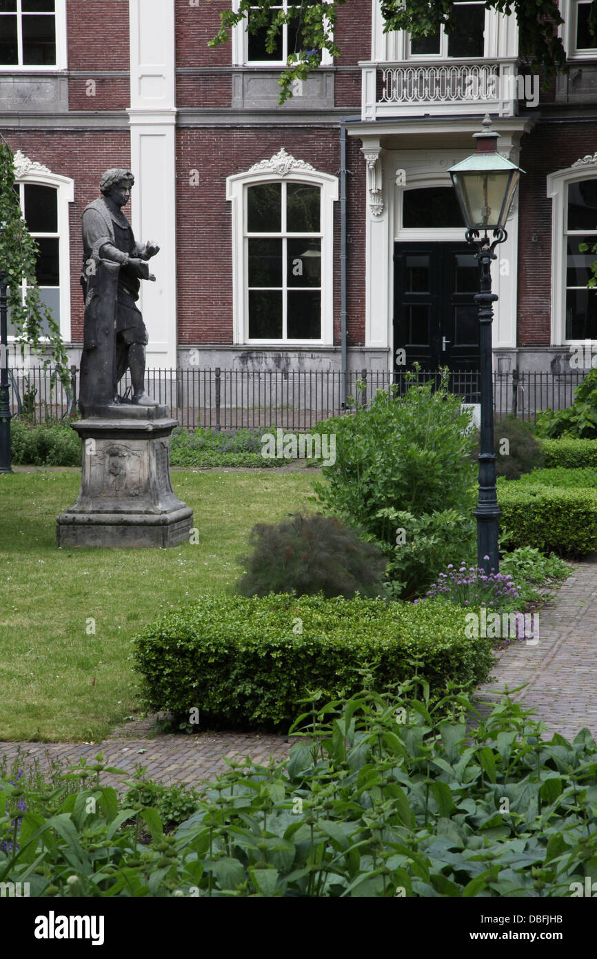 Statue in a courtyard in Haarlem Stock Photo - Alamy