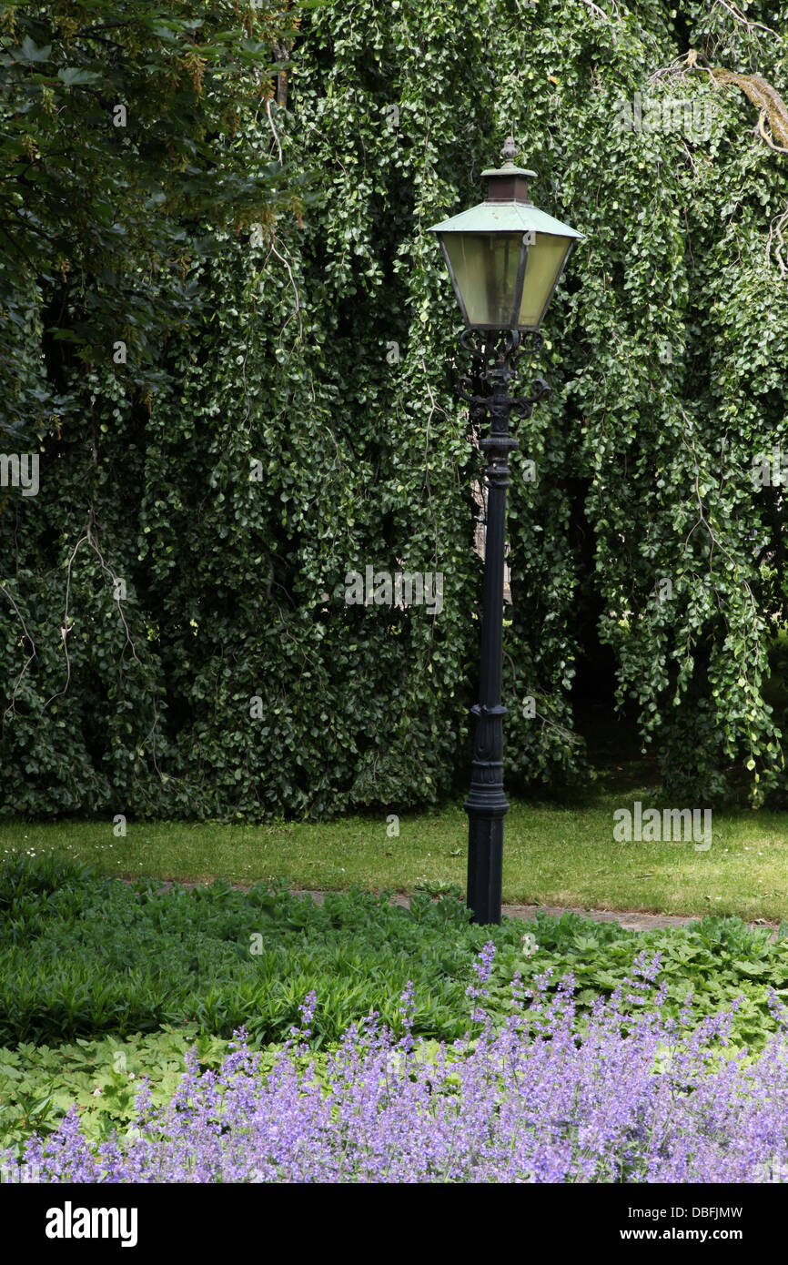 Lamp post in a park in Haarlem Stock Photo - Alamy