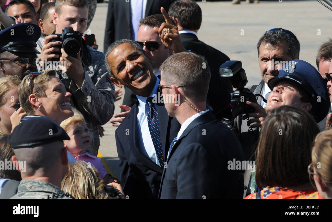 President Barack Obama shares a humorous moment with members of Team ...