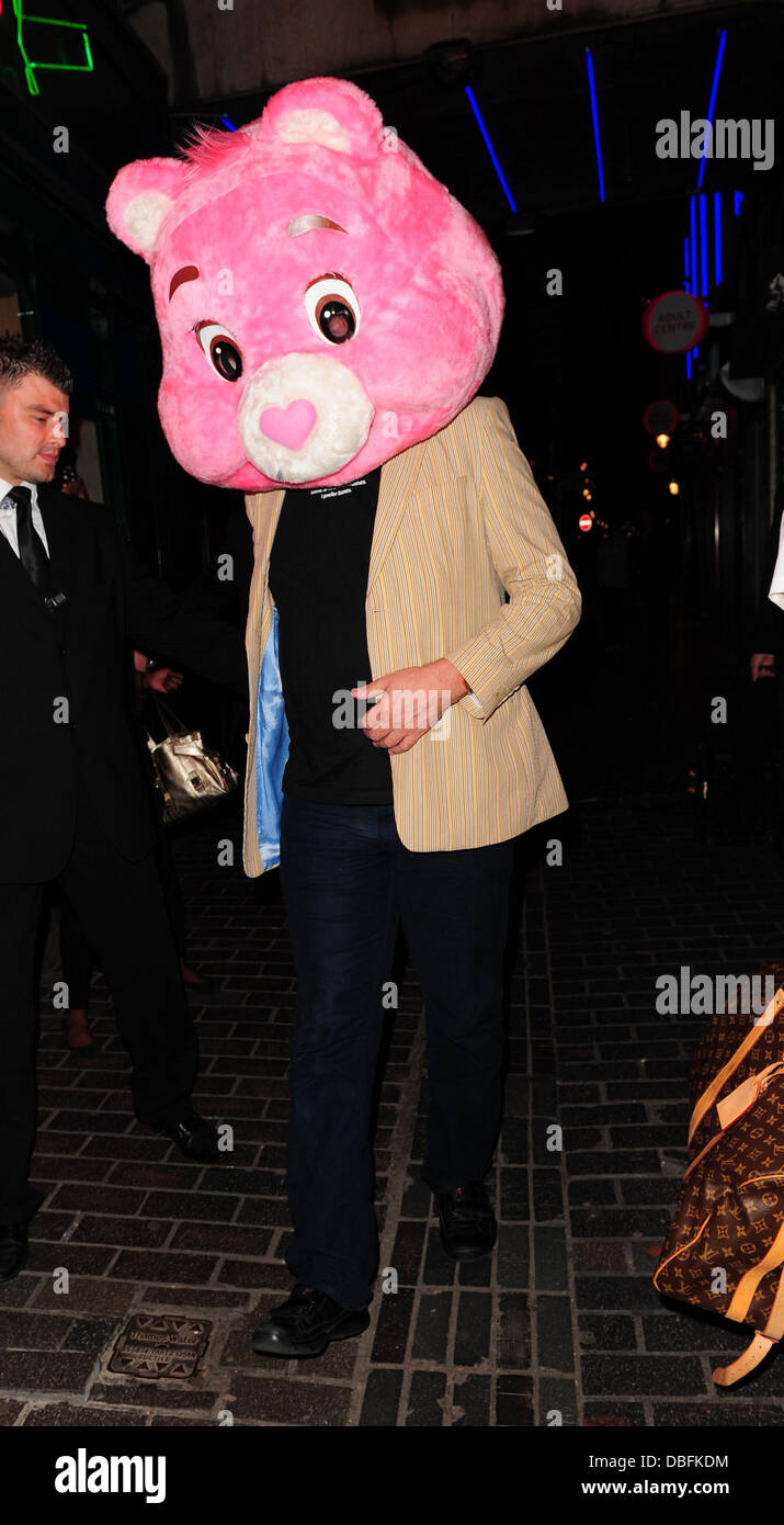 Stephen Fry wearing an oversized pink Care-Bear head celebrities ...
