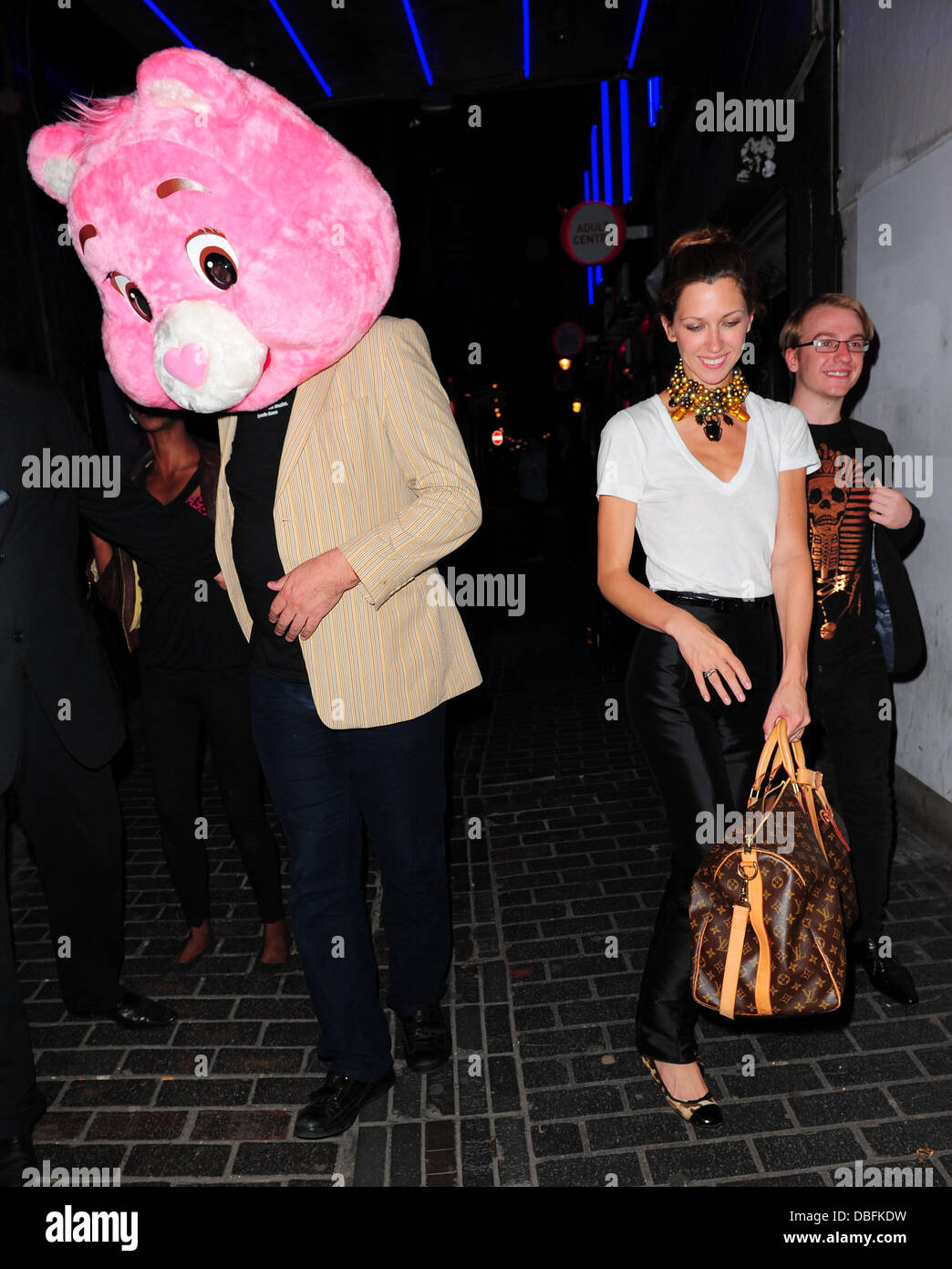 Stephen Fry wearing an oversized pink Care-Bear head and Margo Stilly ...
