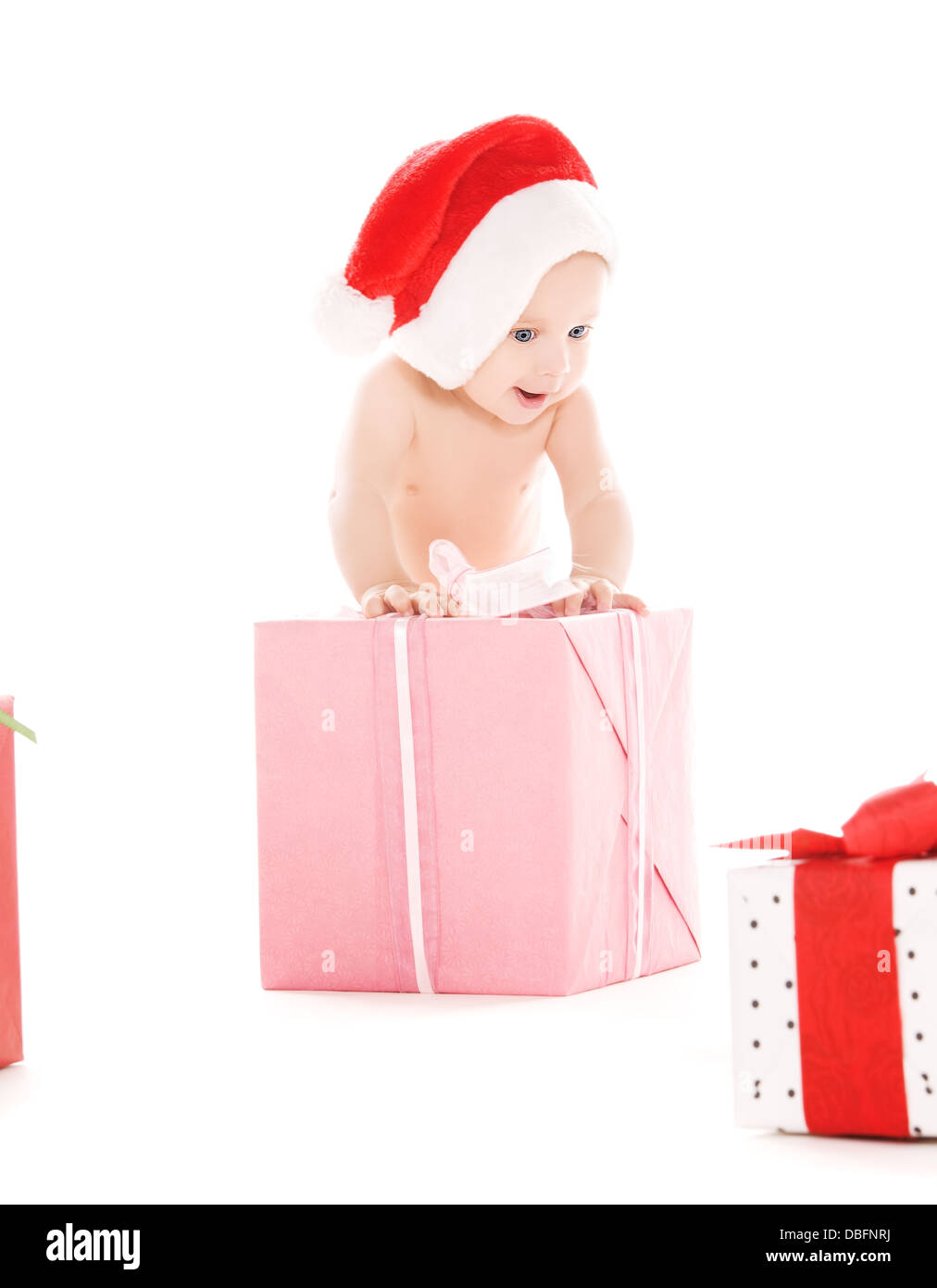 santa helper baby with christmas gifts Stock Photo - Alamy