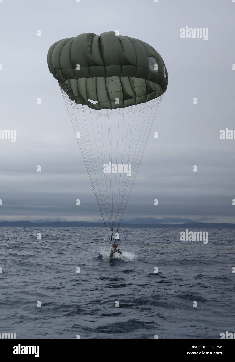 A U.S. Marine parachutes into the Coral Sea July 23 during Talisman ...
