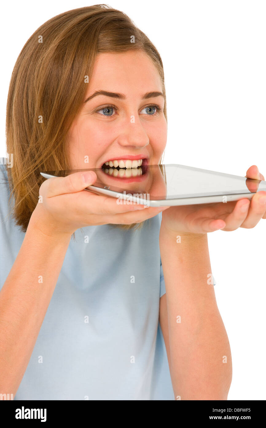 teenage girl with tablet in mouth Stock Photo - Alamy