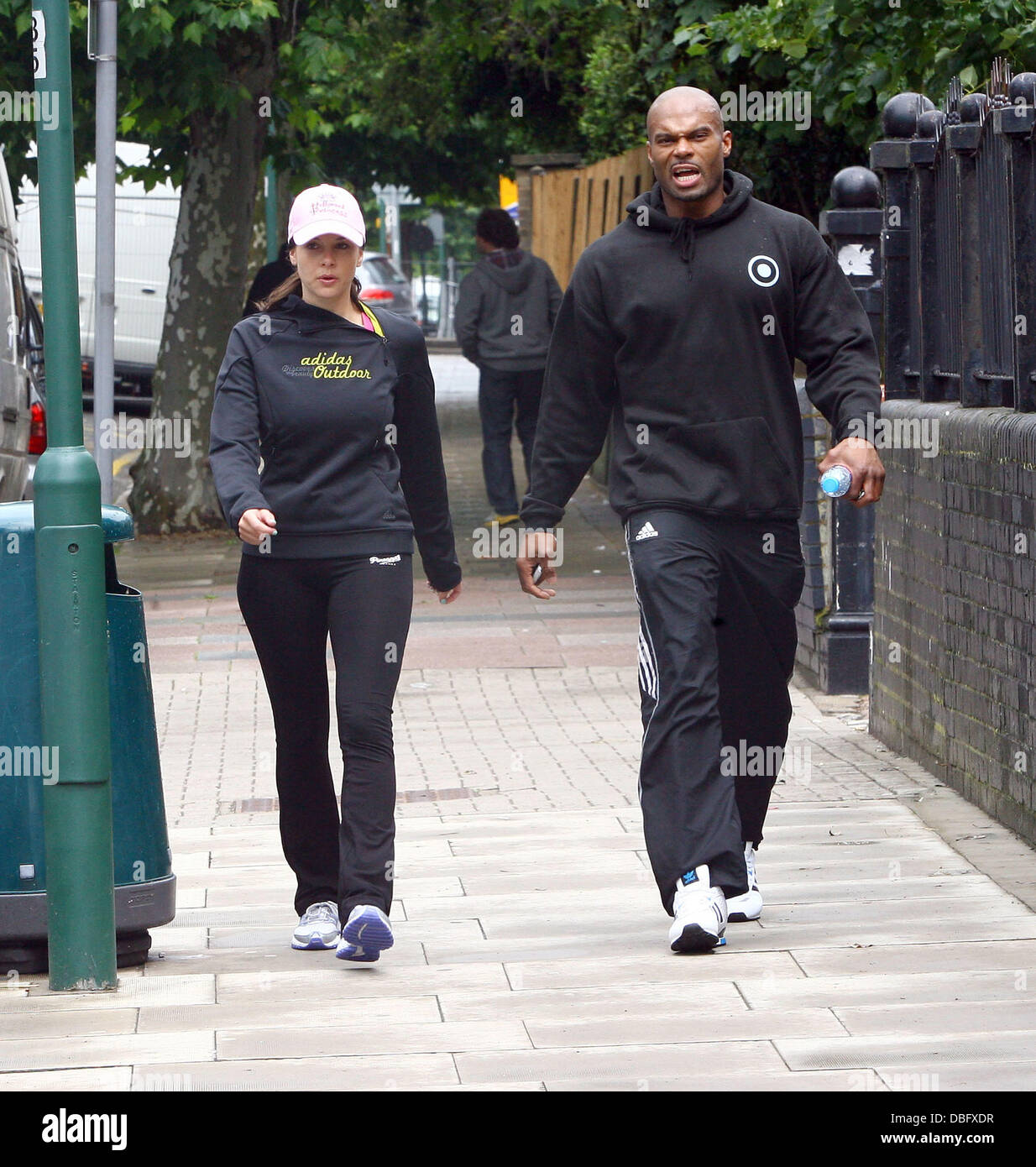 Imogen Thomas works out in a park with her personal trainer London ...
