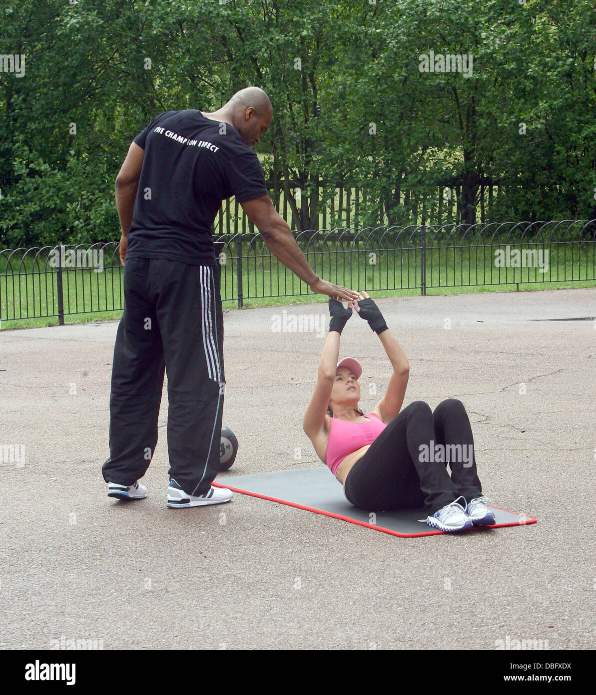 Imogen Thomas works out in a park with her personal trainer London ...