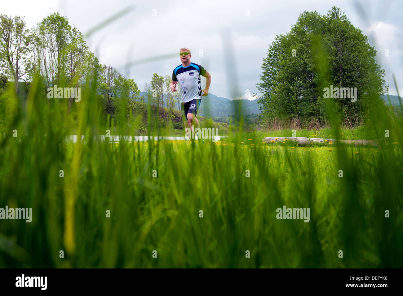 Man running outside Stock Photo - Alamy
