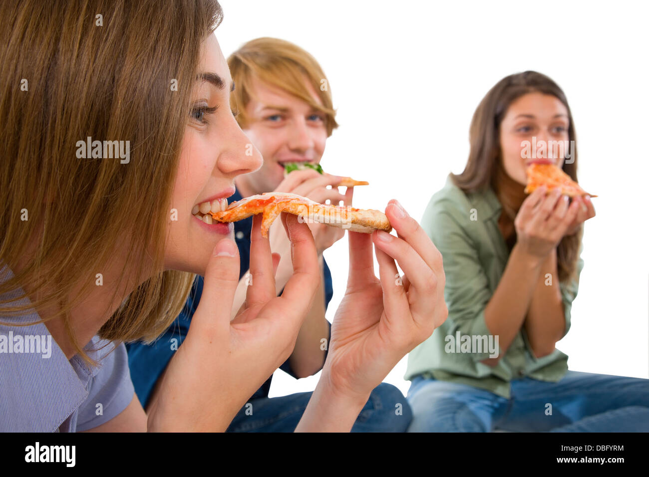 teenagers eating pizza Stock Photo - Alamy