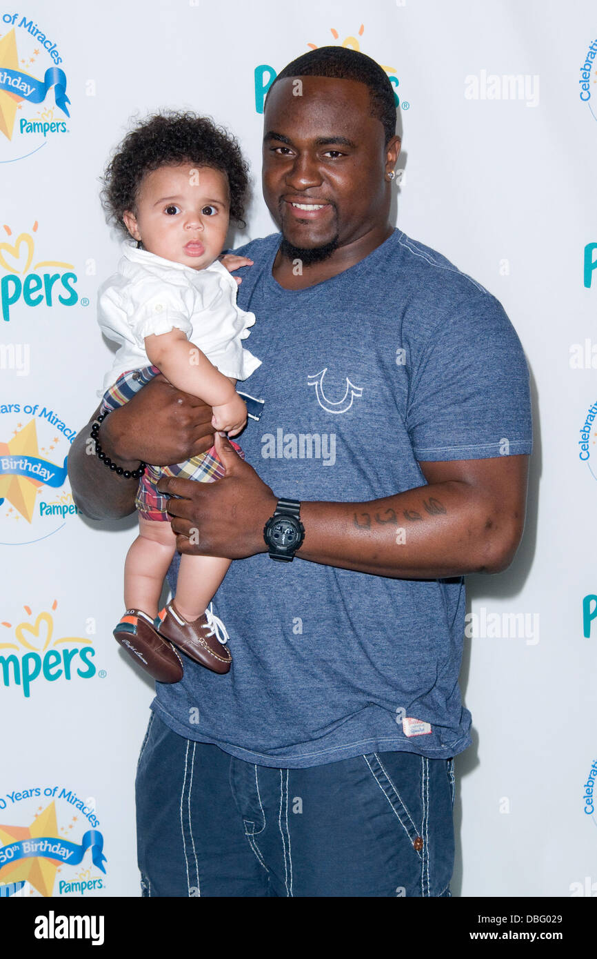 Shonn Greene and his son The Pampers 50th Birthday Celebration New York ...