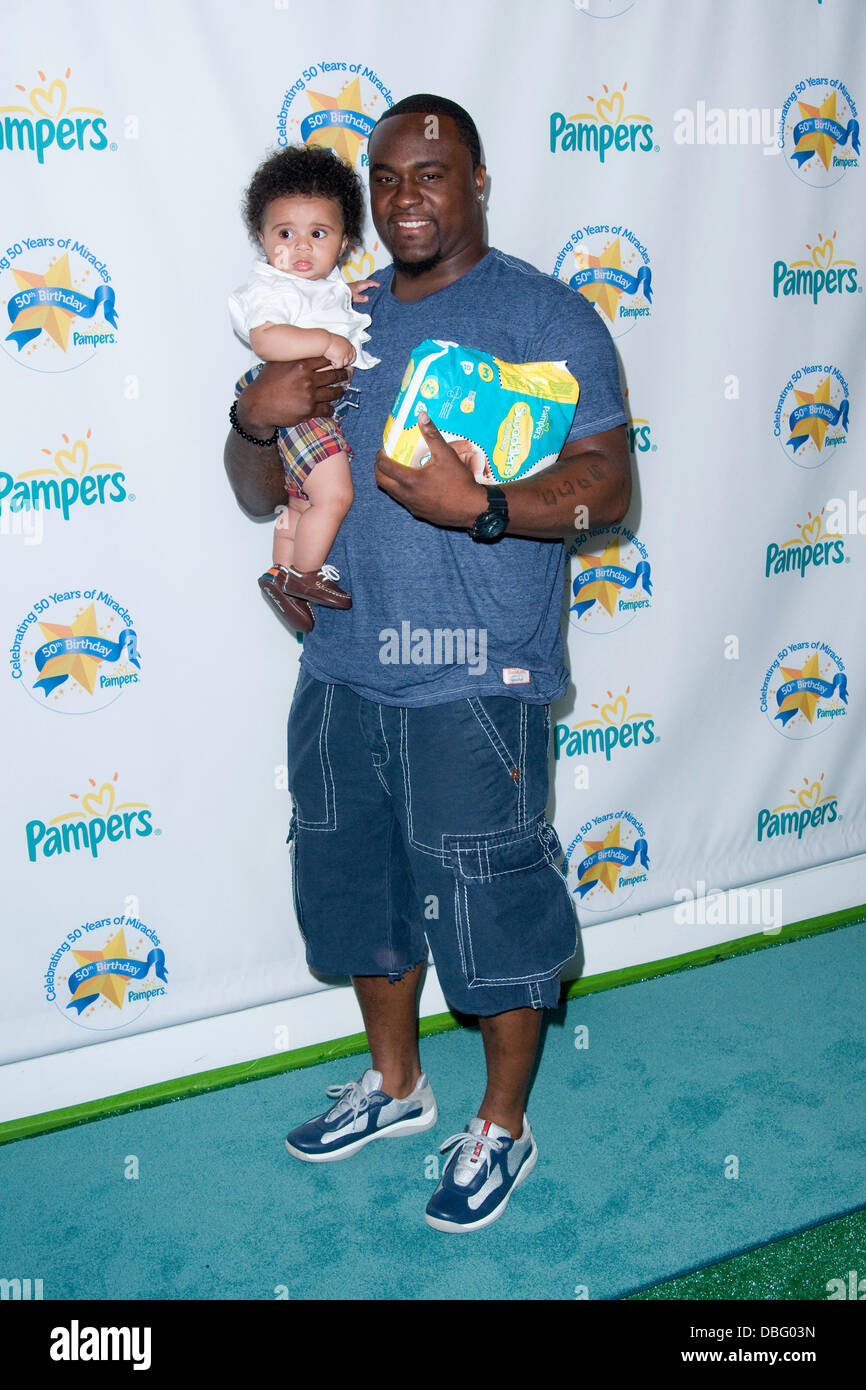 Shonn Greene and his son The Pampers 50th Birthday Celebration New York ...