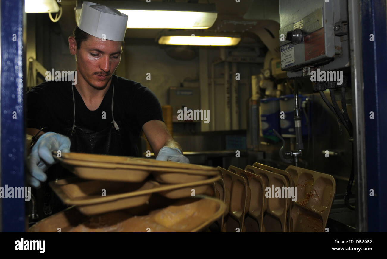 U.S. Navy Aviation Machinist?s Mate 3rd Class Marshall Boykin washes ...