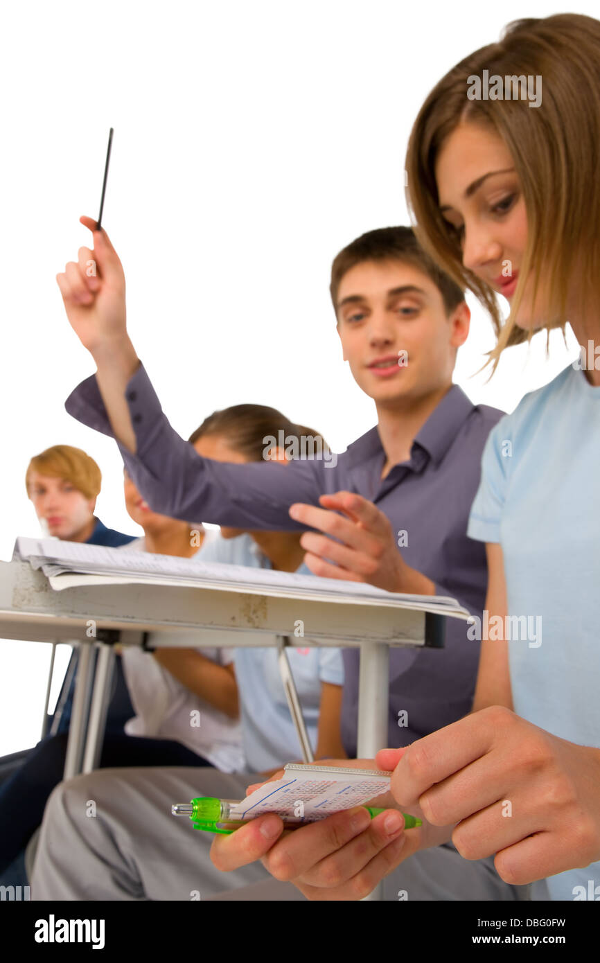 teenage girl copying classmate's assignment Stock Photo - Alamy