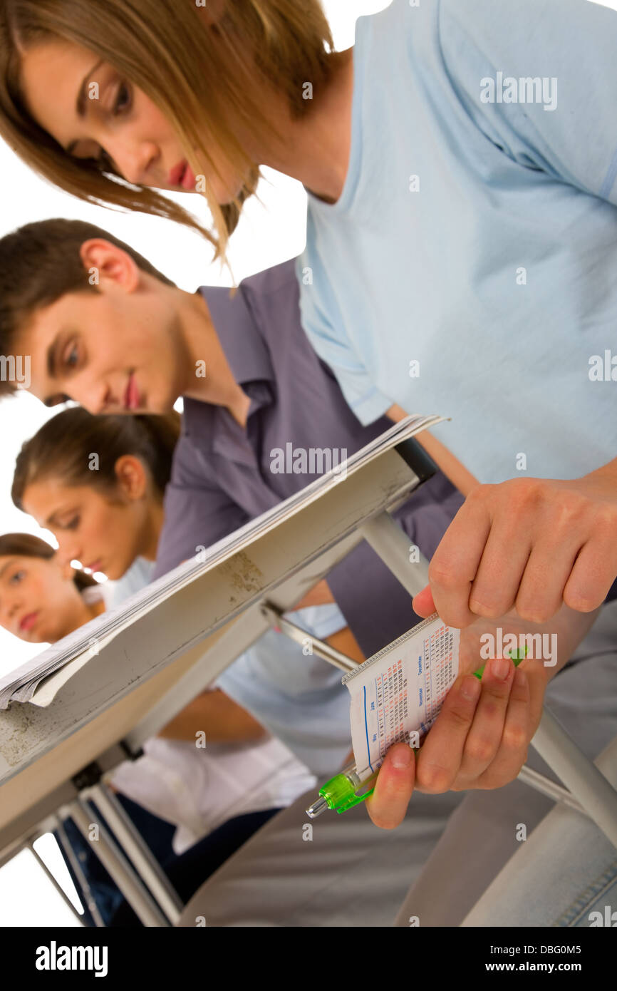 teenage girl copying classmate's assignment Stock Photo - Alamy