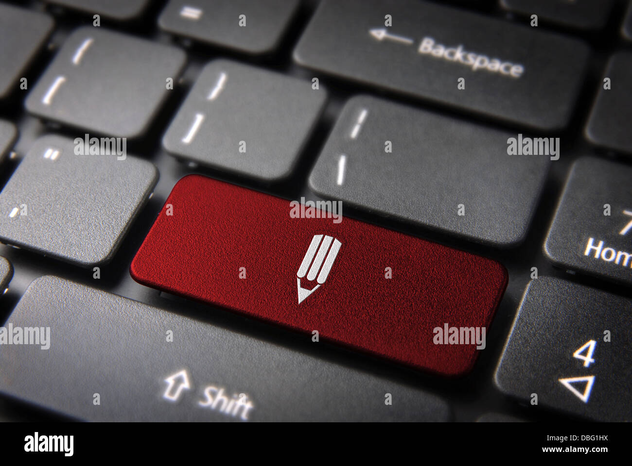 Red keyboard pencil key art background Stock Photo - Alamy