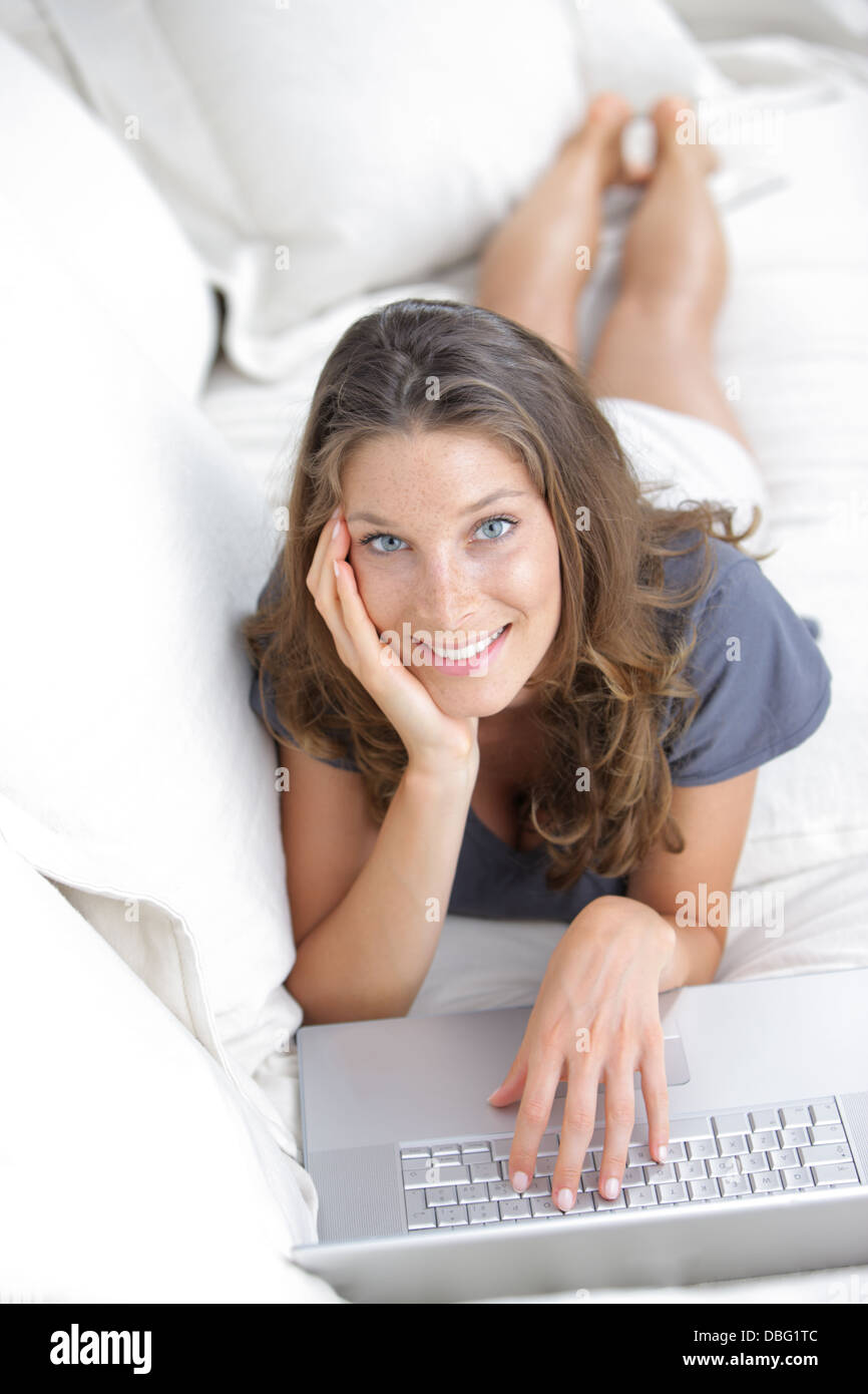 Beautiful woman surfing the net Stock Photo - Alamy