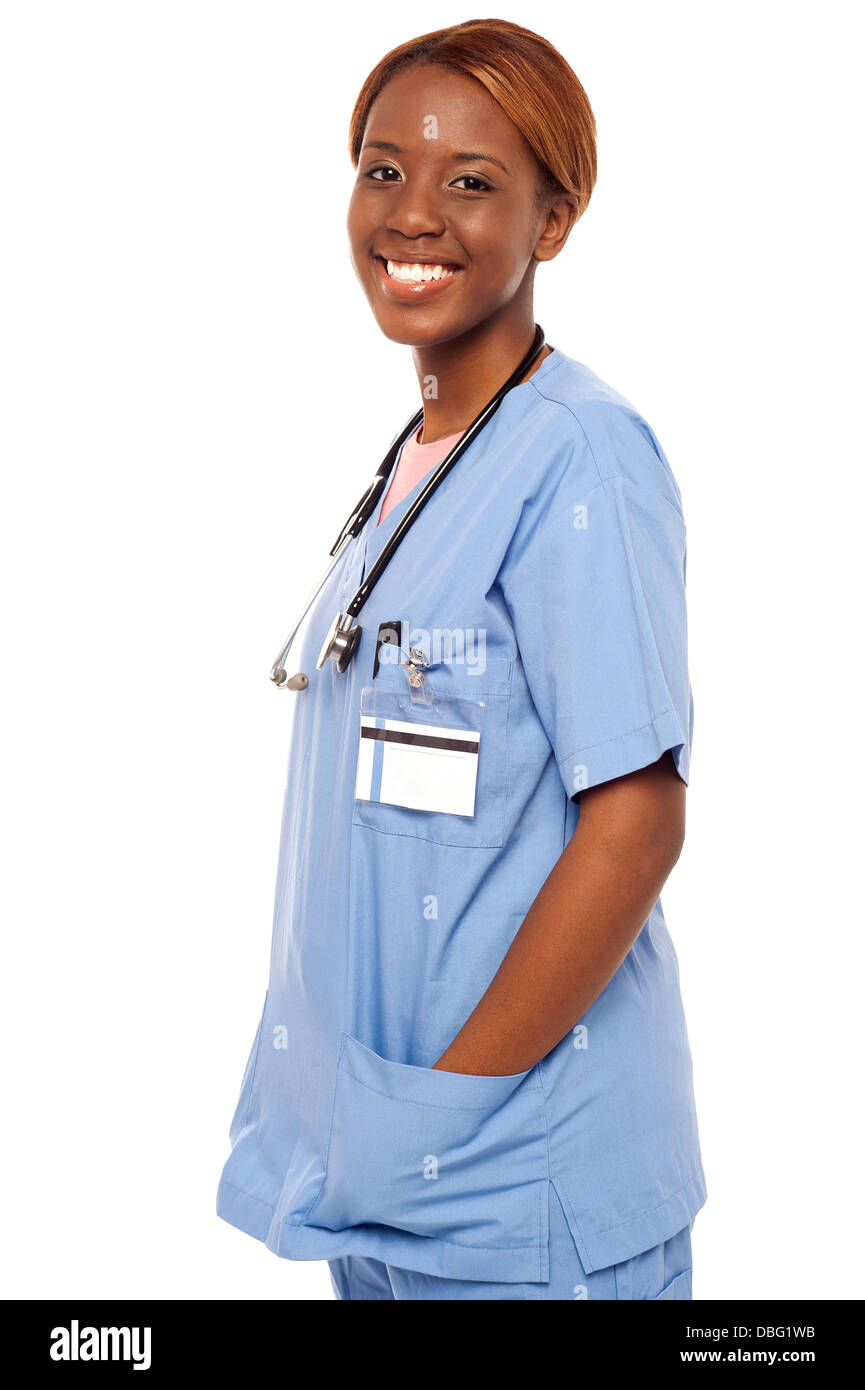 African female nurse posing casually in uniform Stock Photo - Alamy
