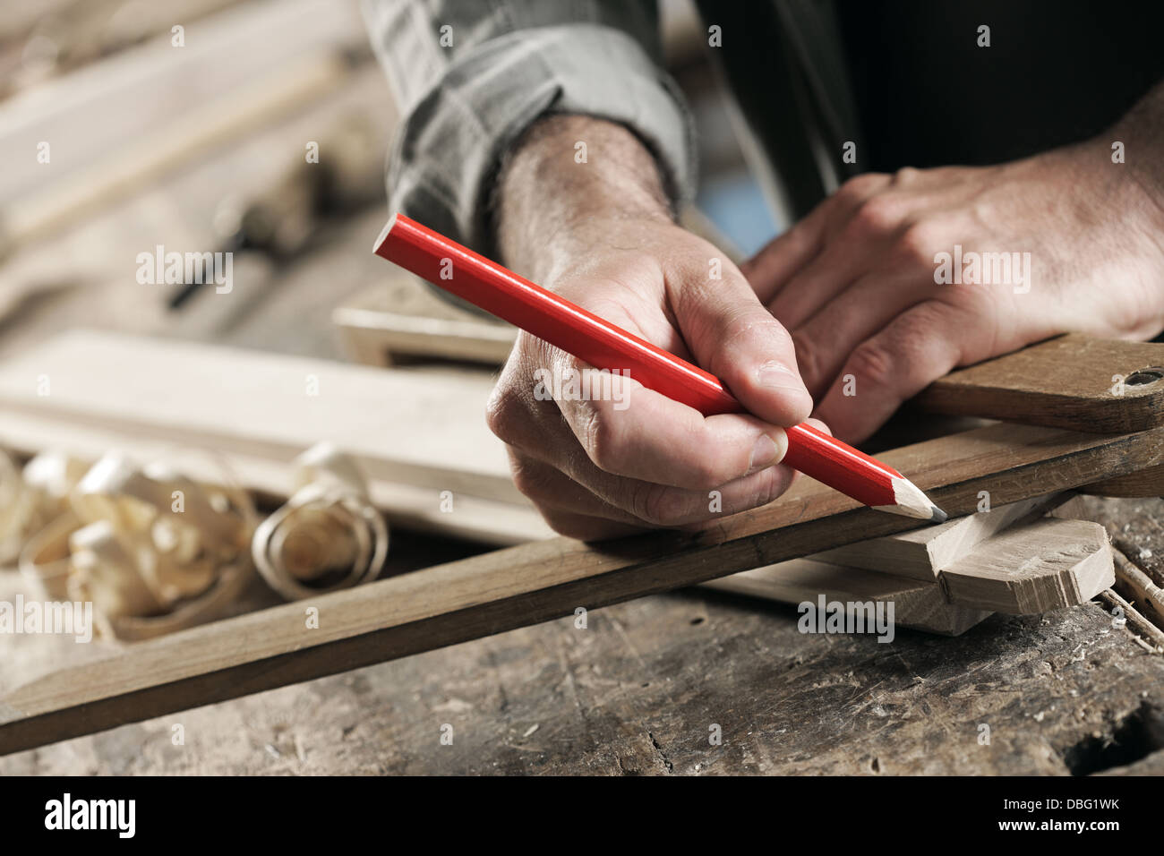 Carpenter Marking a Wooden Plank Stock Photo - Alamy