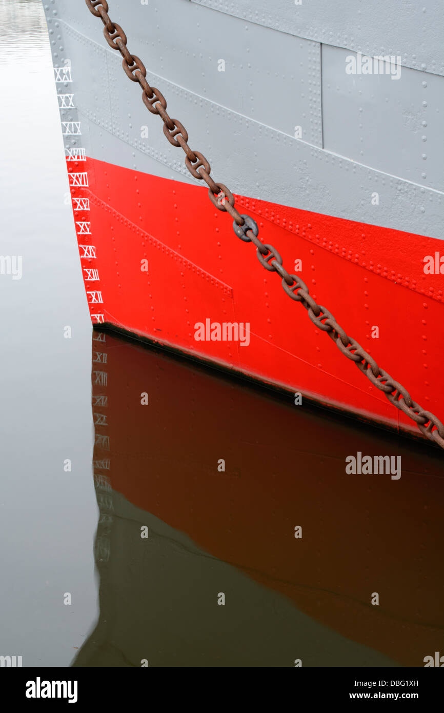 Reflection of the hull of a boat in calm water Stock Photo - Alamy