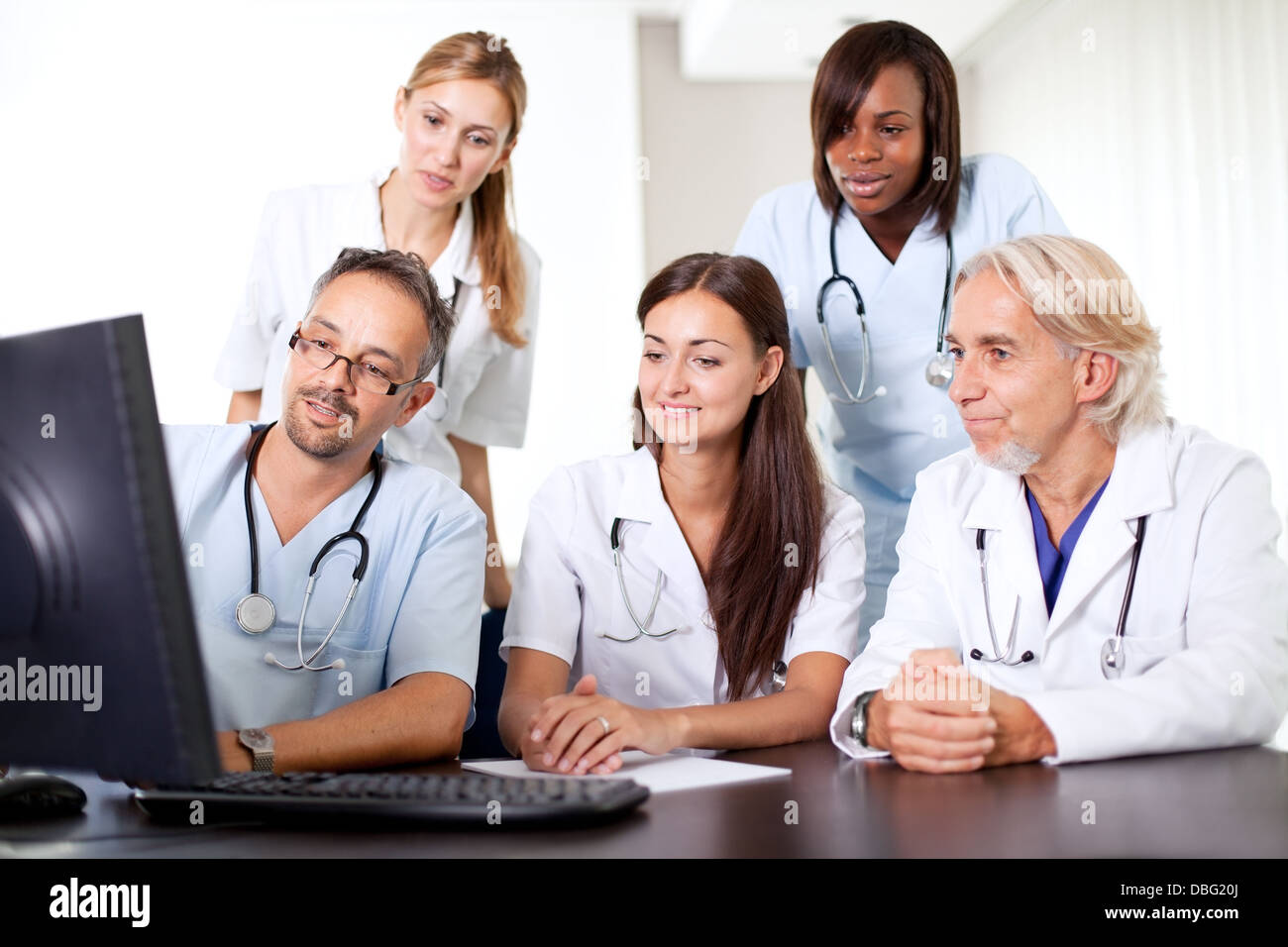 Friendly group of doctors at the hospital Stock Photo - Alamy